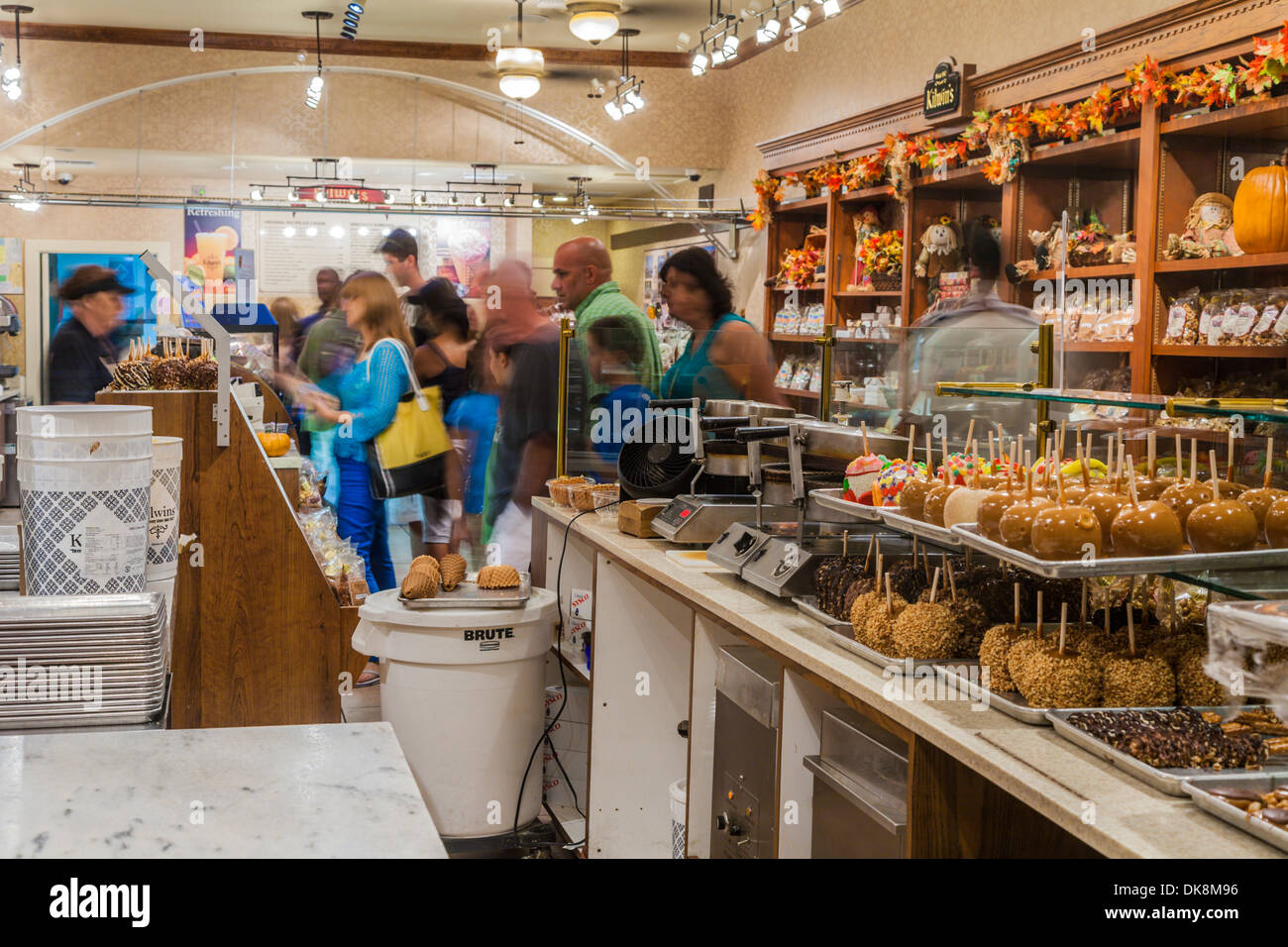 Workers server sweet treats to visitors at Kilwin's in St. Augustine ...