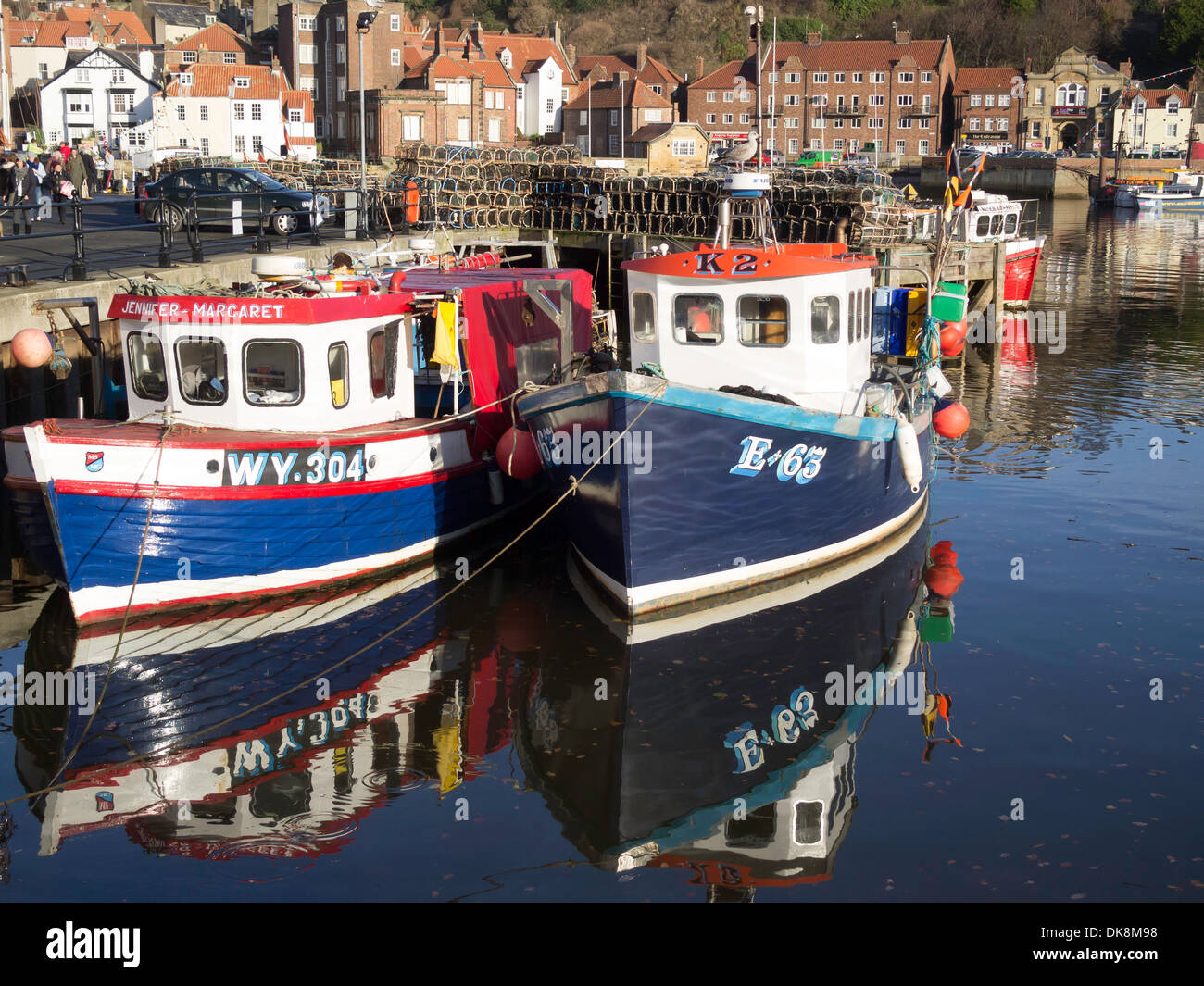 Fishing boats at New Quay Wharf in Whitby harbour North Yorkshire UK ...