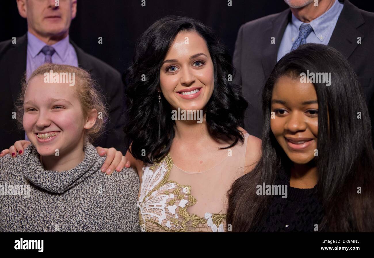 New York, USA. 3rd December 2013. Singer Katy Perry (C) poses for ...