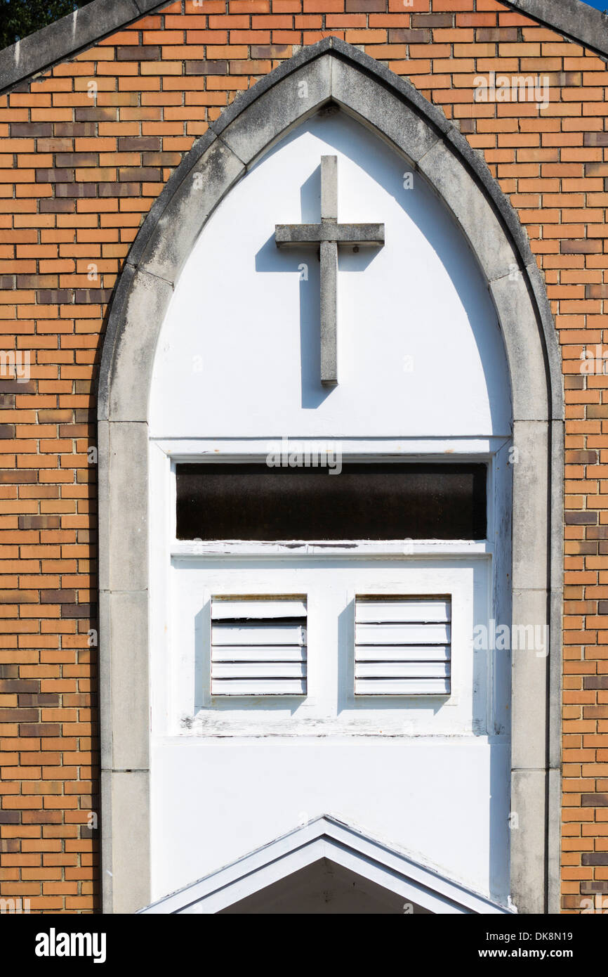 Cross in arch over entrance to a brick church in Green Cove Springs ...