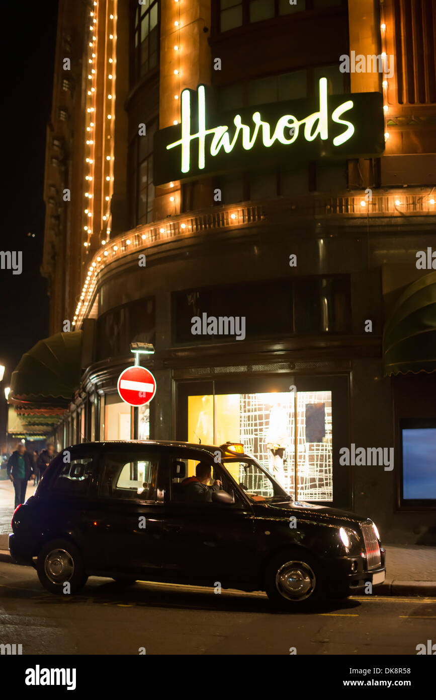 Illuminated facade of the harrods brompton road hi-res stock ...