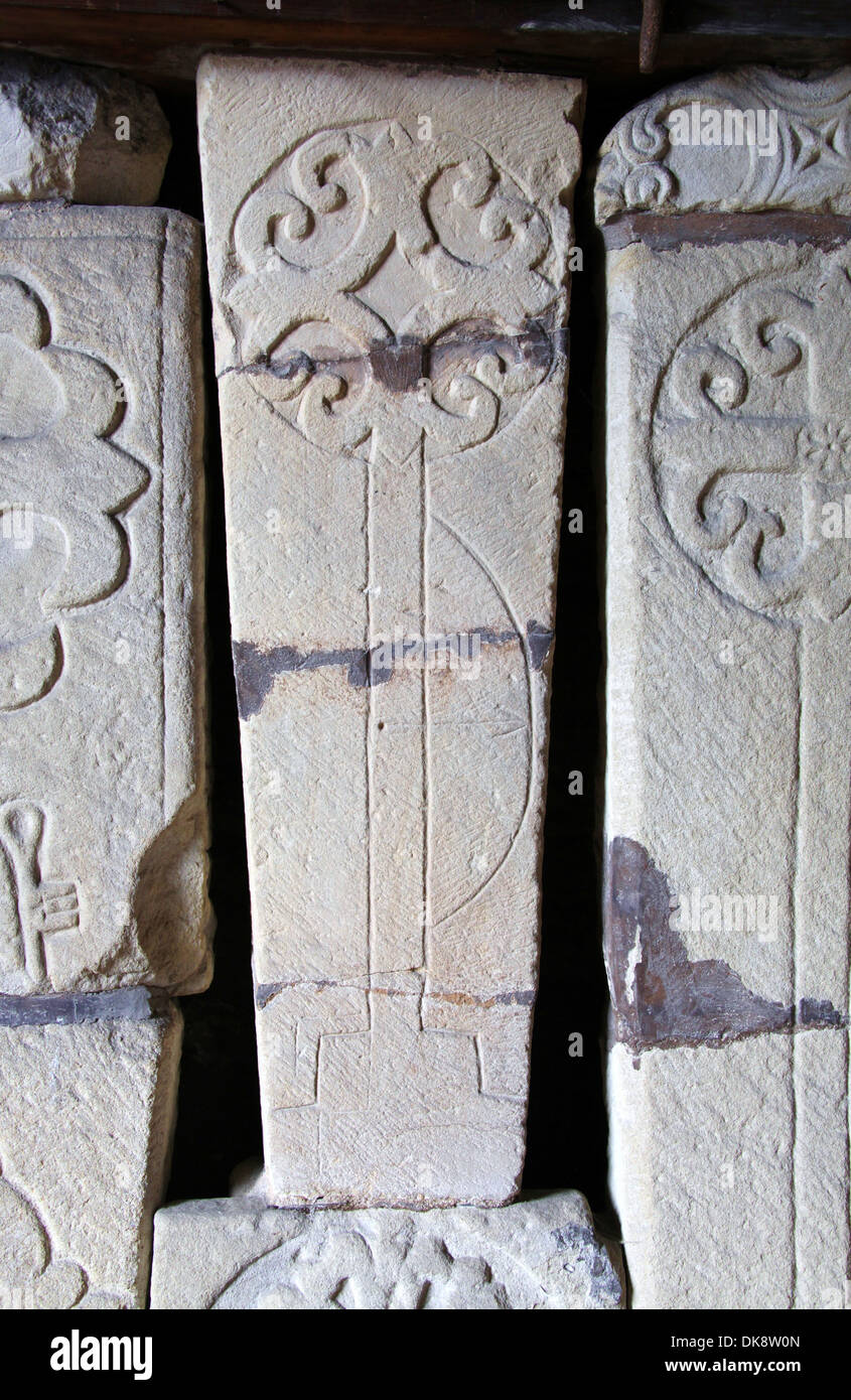 Medieval Stone Grave Slab carved with a Bow and Arrow Stock Photo - Alamy