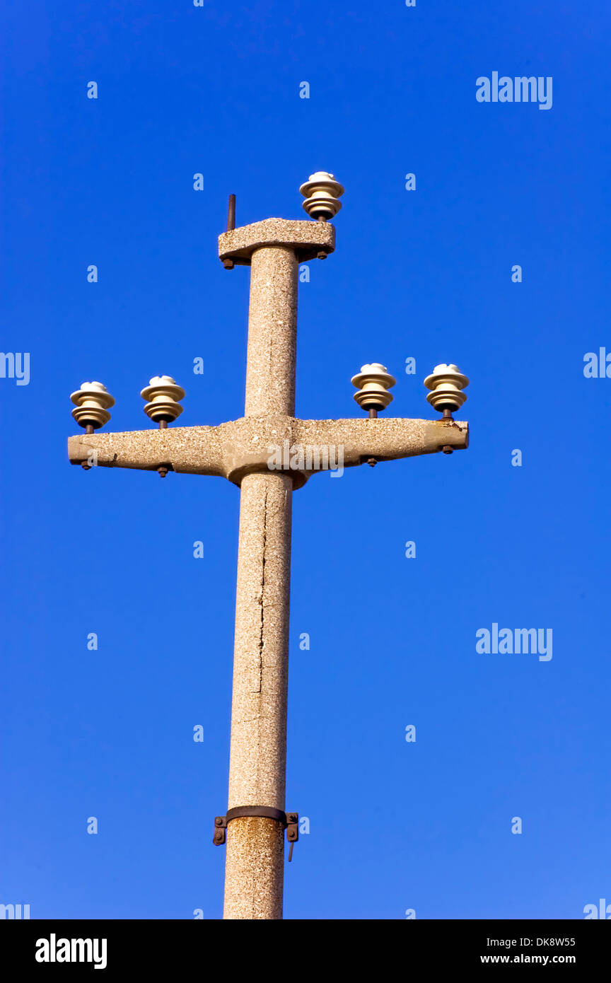 Old light pole without cables against a blue sky Stock Photo - Alamy