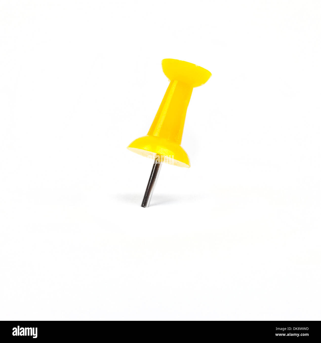 Yellow map pin on a white background Stock Photo - Alamy