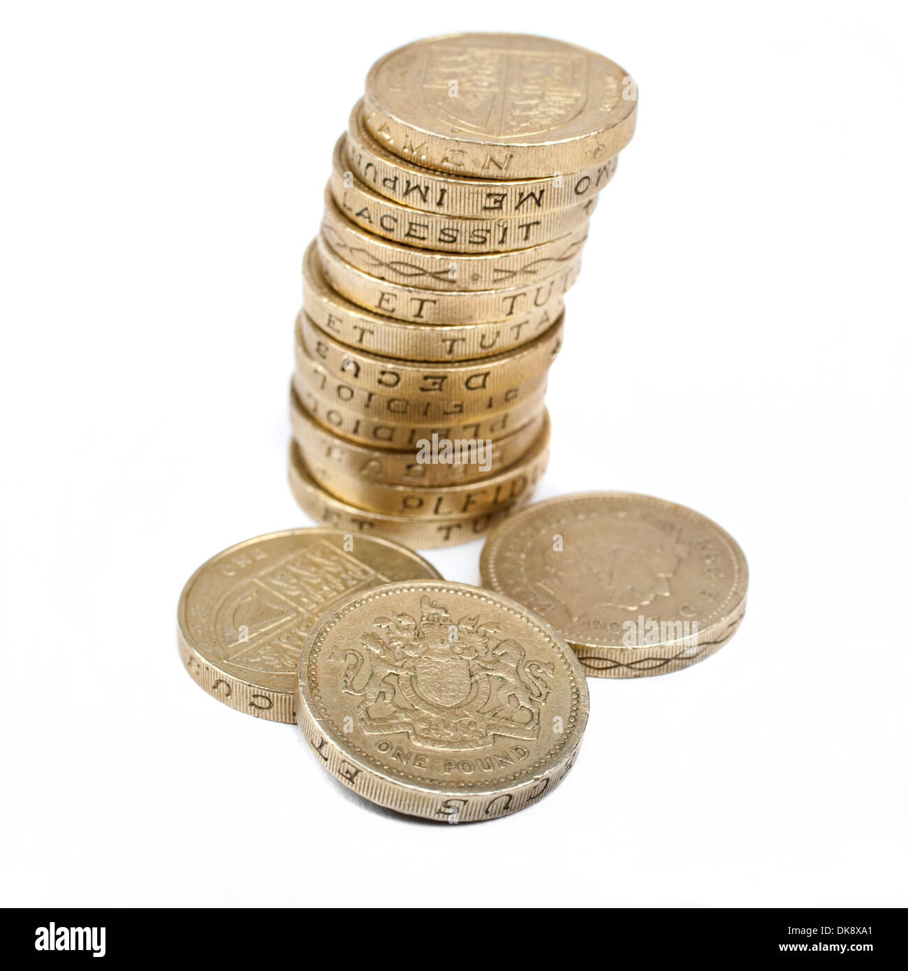 One Pound coins on a white background Stock Photo - Alamy