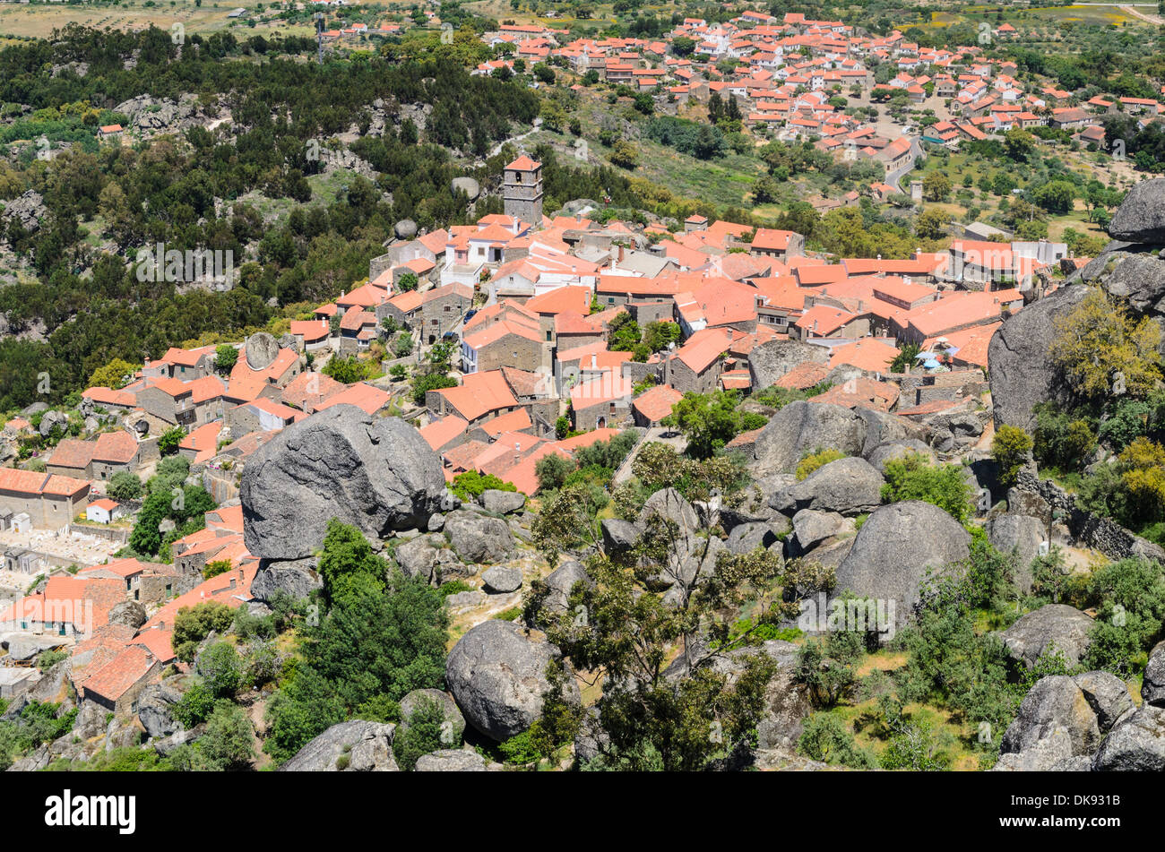 The red roofed medieval village of Monsanto with its large granite ...