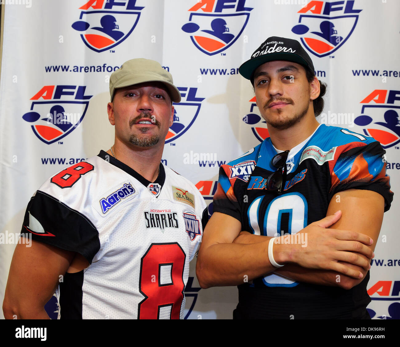 August 11, 2011: Arizona Rattlers quarterback Nick Davila poses with Jacksonville Sharks ...