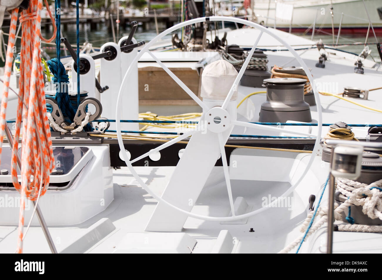 Detail of a sailboat: rudder, grinders, winches and rigging Stock Photo ...