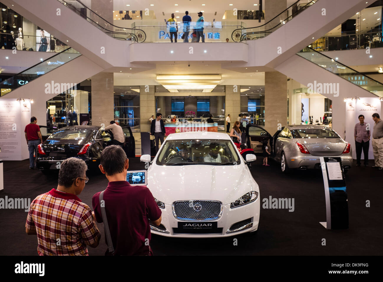 A display of Jaguar cars in the Pavilion shopping mall in Kuala Lumpur ...
