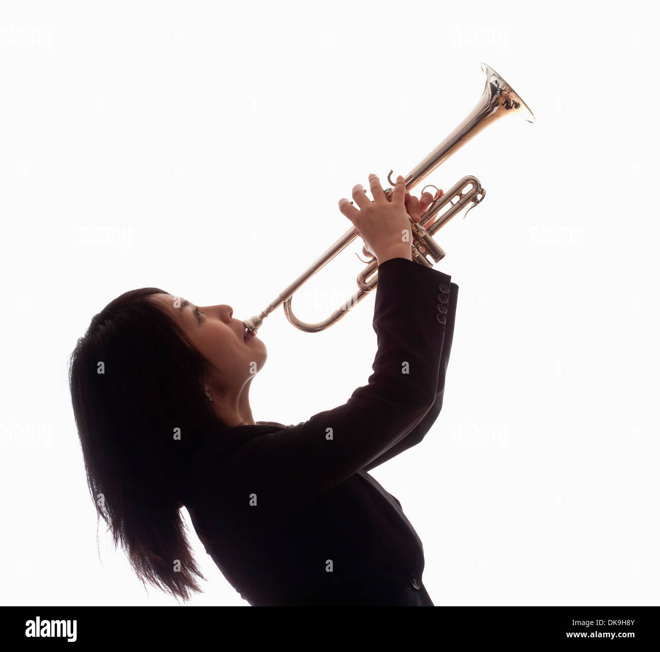 Female playing trumpet hi-res stock photography and images - Alamy
