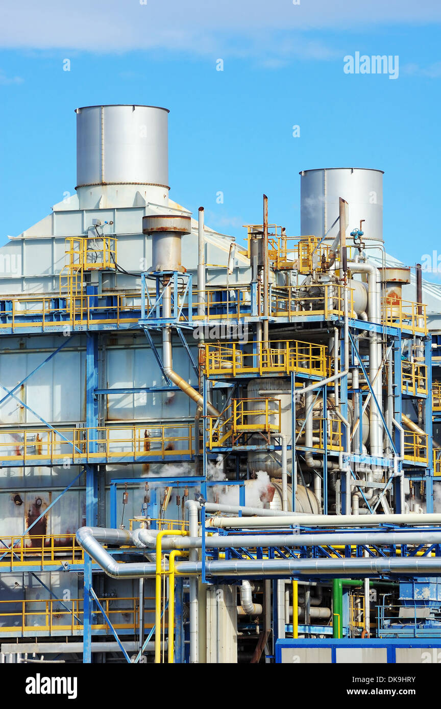 Industrial building with pipes and chimneys Stock Photo - Alamy