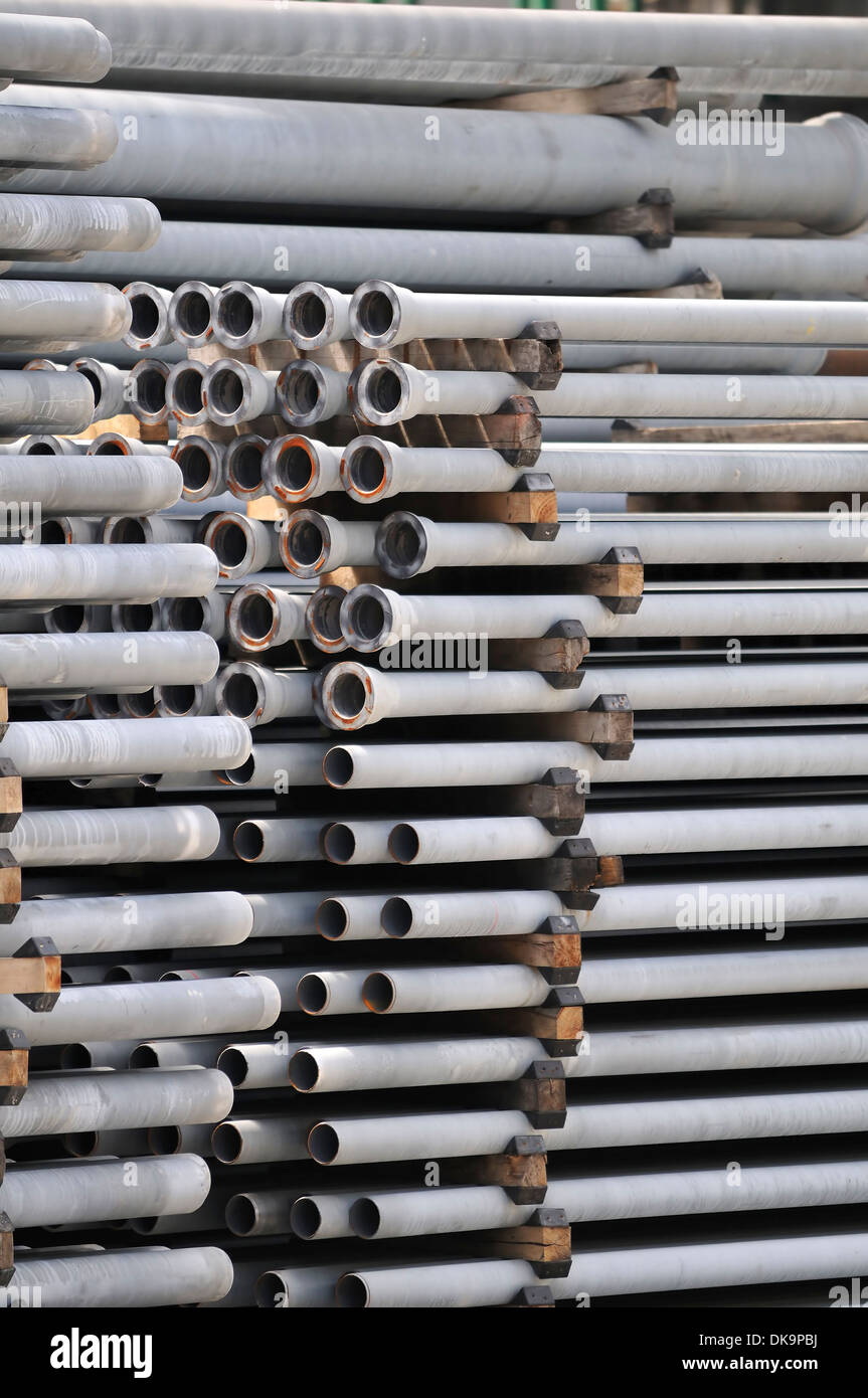 Detail of stack of long pipes Stock Photo - Alamy