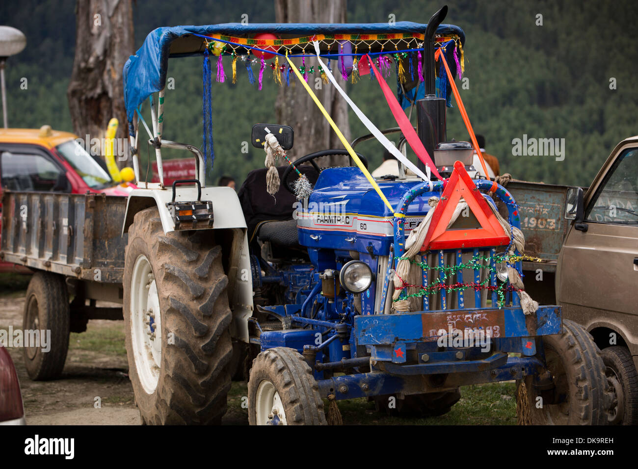 Bhutan, Phobjika valley, farmtrac tractor, dressed for Gangte Goemba ...