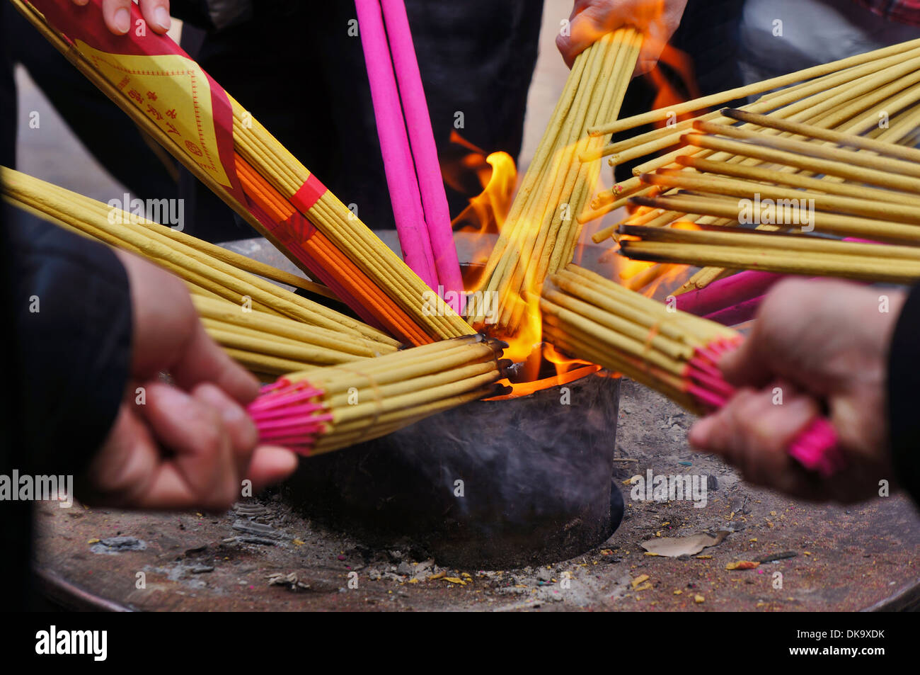 Incense being lit in a temple, Shanghai, China Stock Photo - Alamy