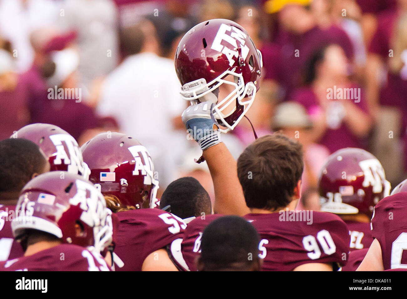 Sept. 4, 2011 - Houston, Texas, U.S - An Aggie player raises his helmet ...