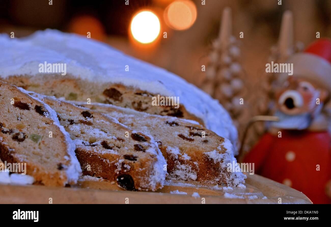 Chemnitz, Germany. 03rd Dec, 2013. Stollen from the mine is sliced on a ...