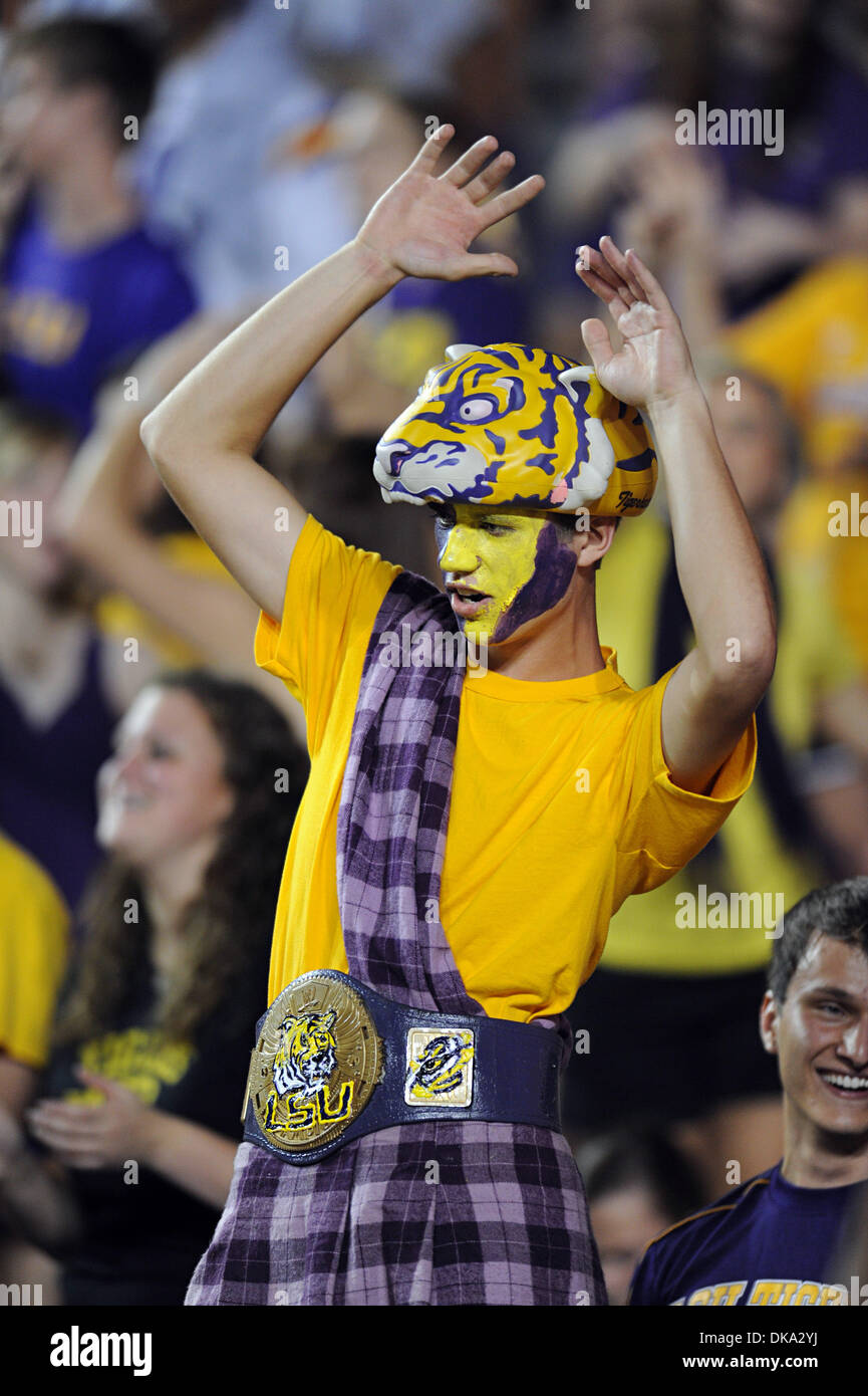 An LSU fan in the student section cheers for his team in the Div. 1 ...