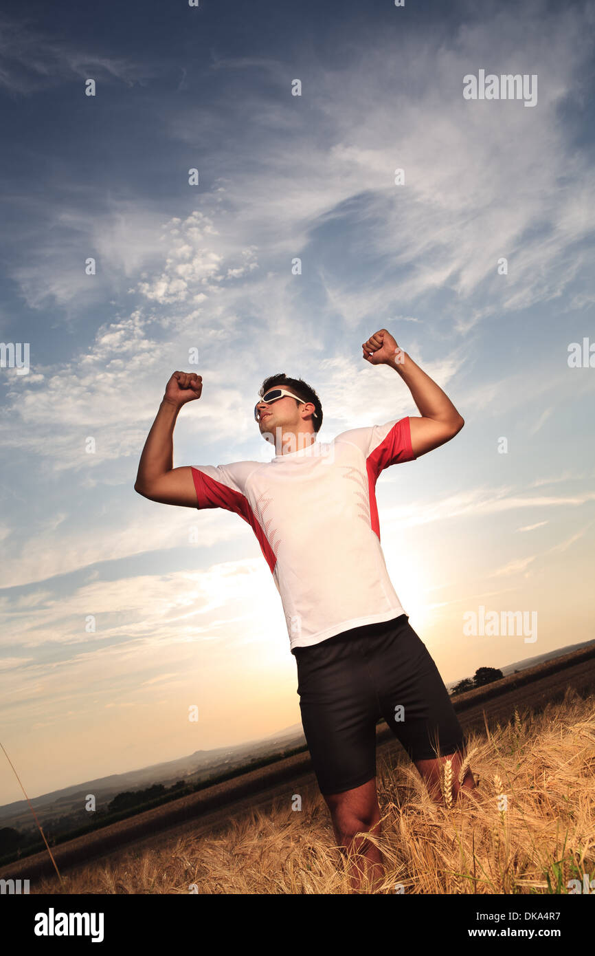 man jogging through the fields Stock Photo - Alamy