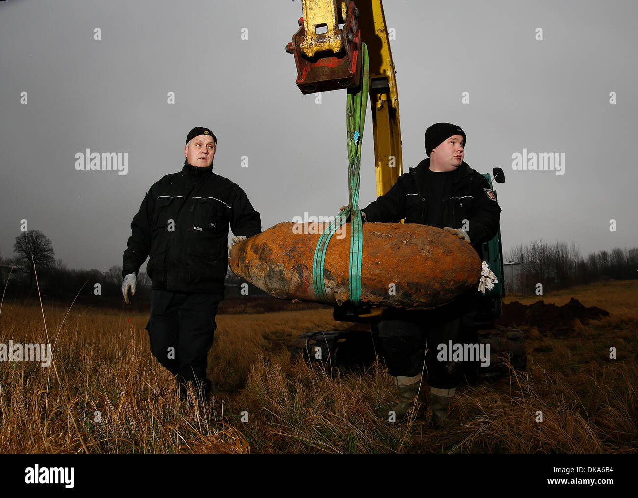 Kiel, Germany. 04th Dec, 2013. A 250 kilo aerial bomb is removed by the ...