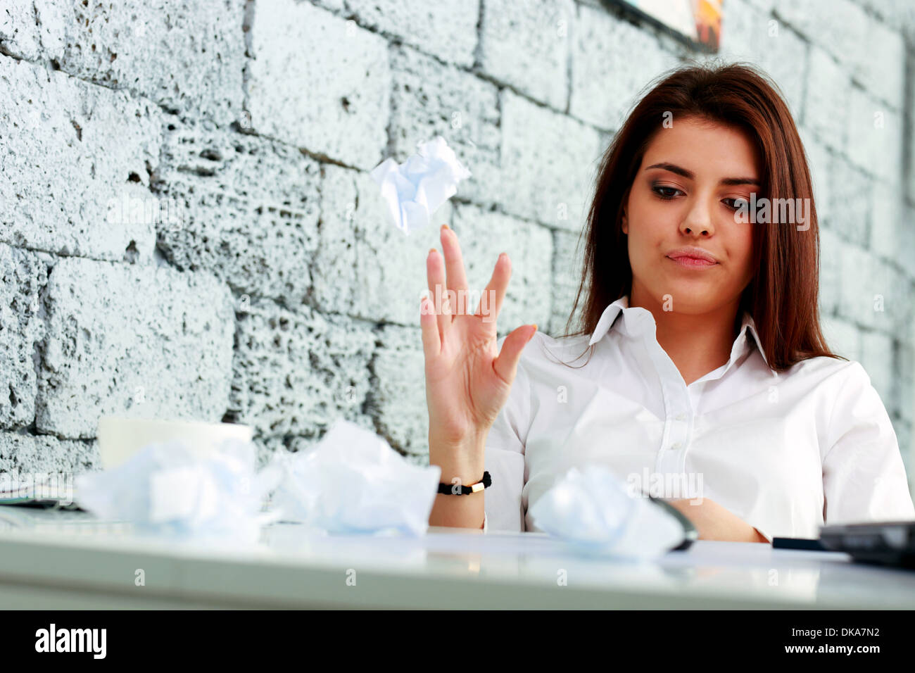 Businesswoman throwing paper table hi-res stock photography and images ...