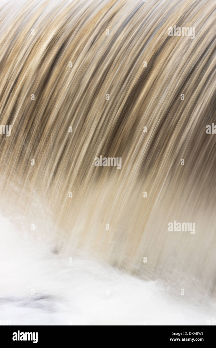 Closeup of a falling water of a waterfall Stock Photo - Alamy