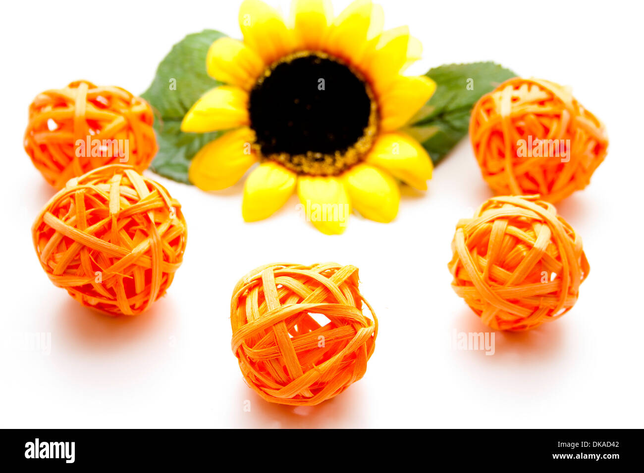 Straw balls with sunflower Stock Photo - Alamy