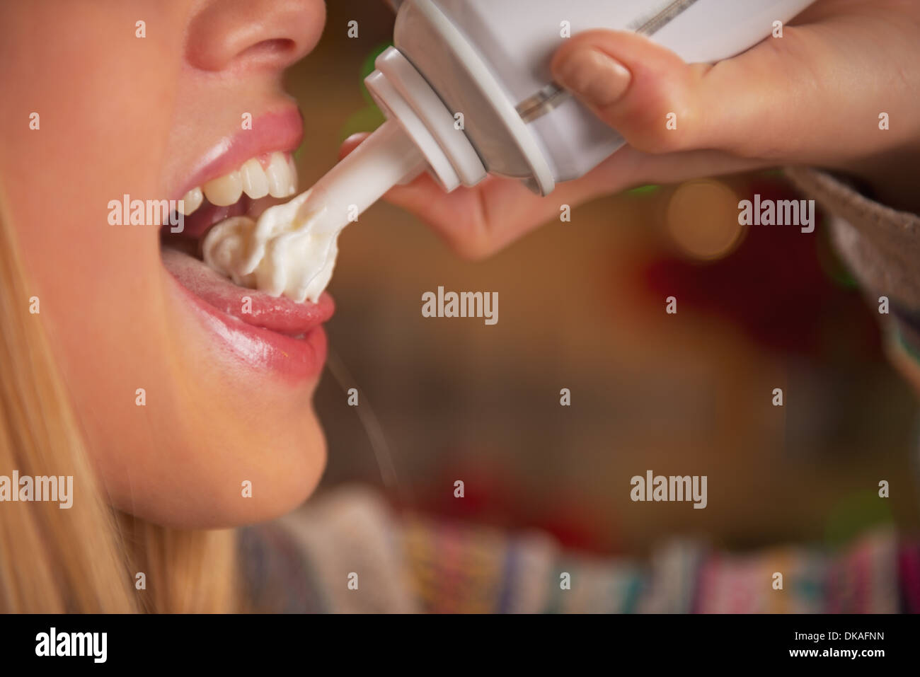 Woman eating whipped cream hi-res stock photography and images - Alamy