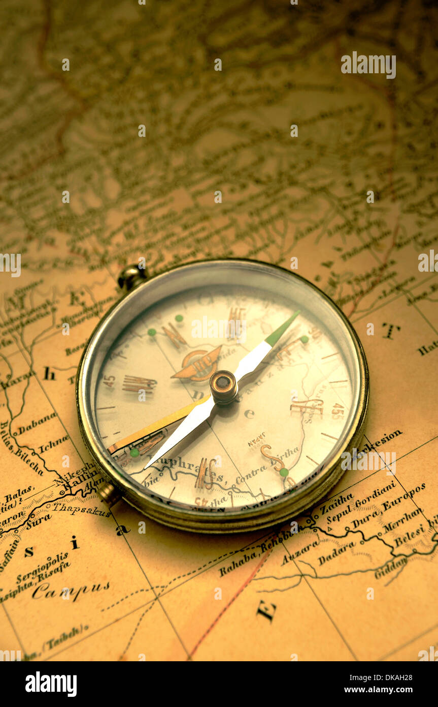 Compass on map Stock Photo - Alamy