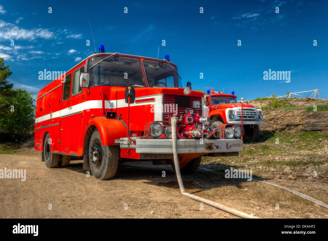 Red fire brigade vehicle hi-res stock photography and images - Alamy