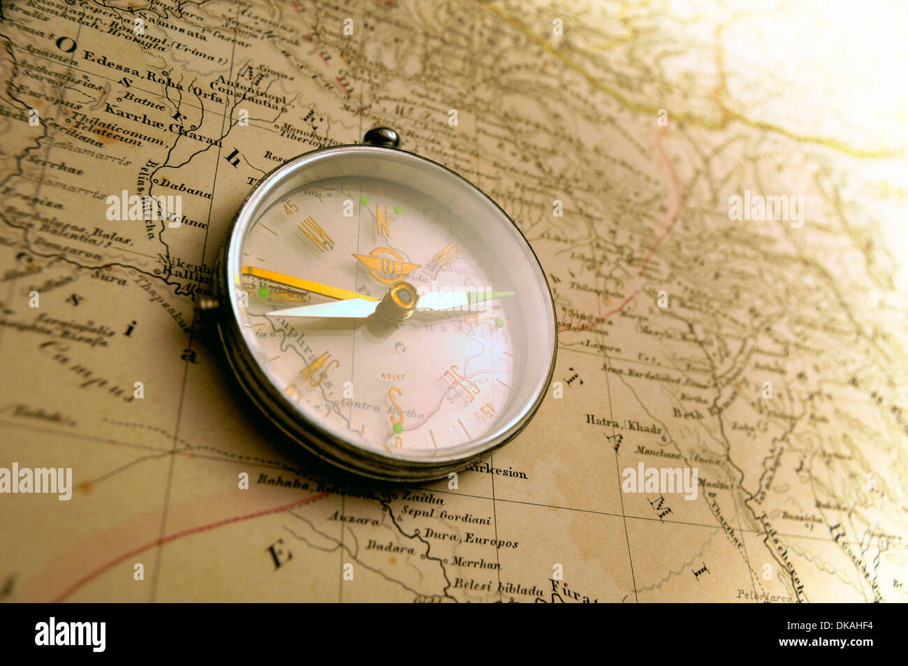 Compass on map Stock Photo - Alamy