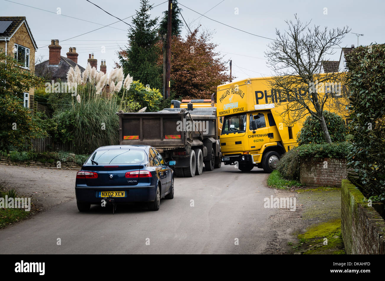 Traffic congestion in a narrow rural lane caused by a removal van at ...