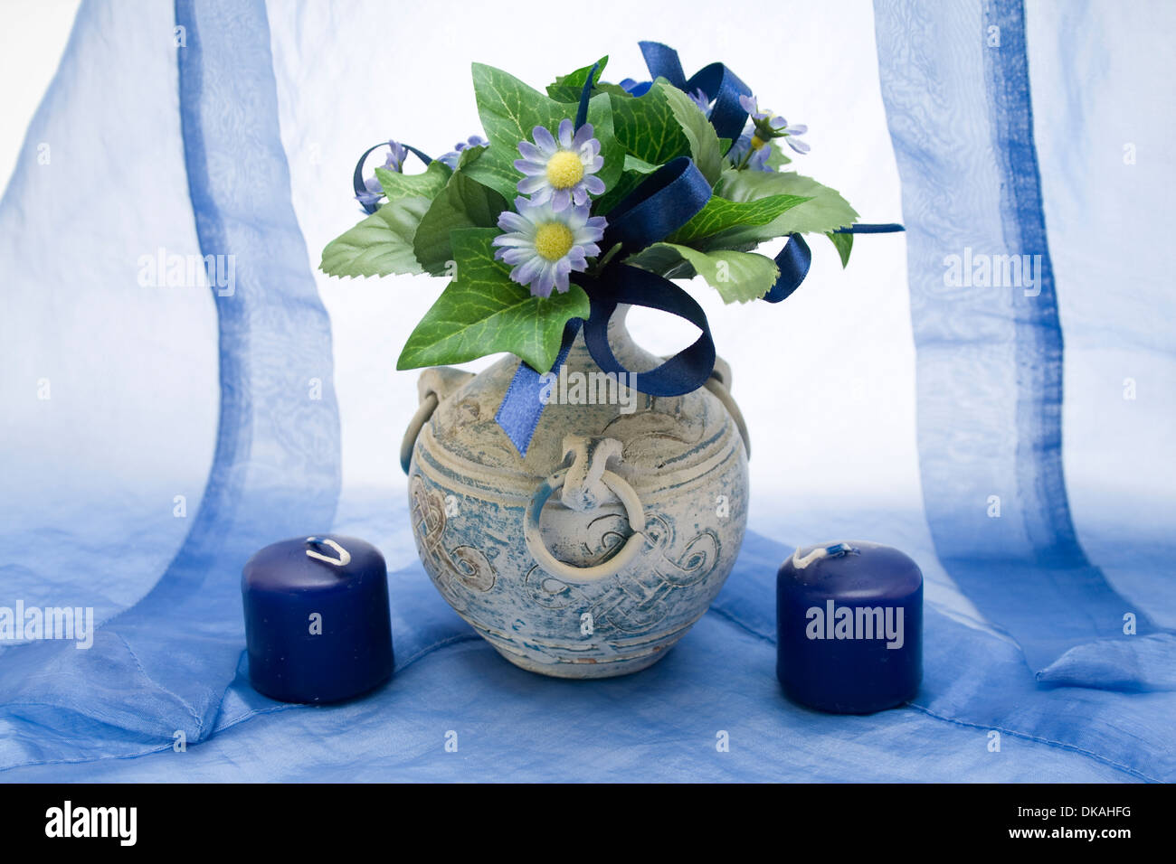 Roses with cheroot candle Stock Photo - Alamy