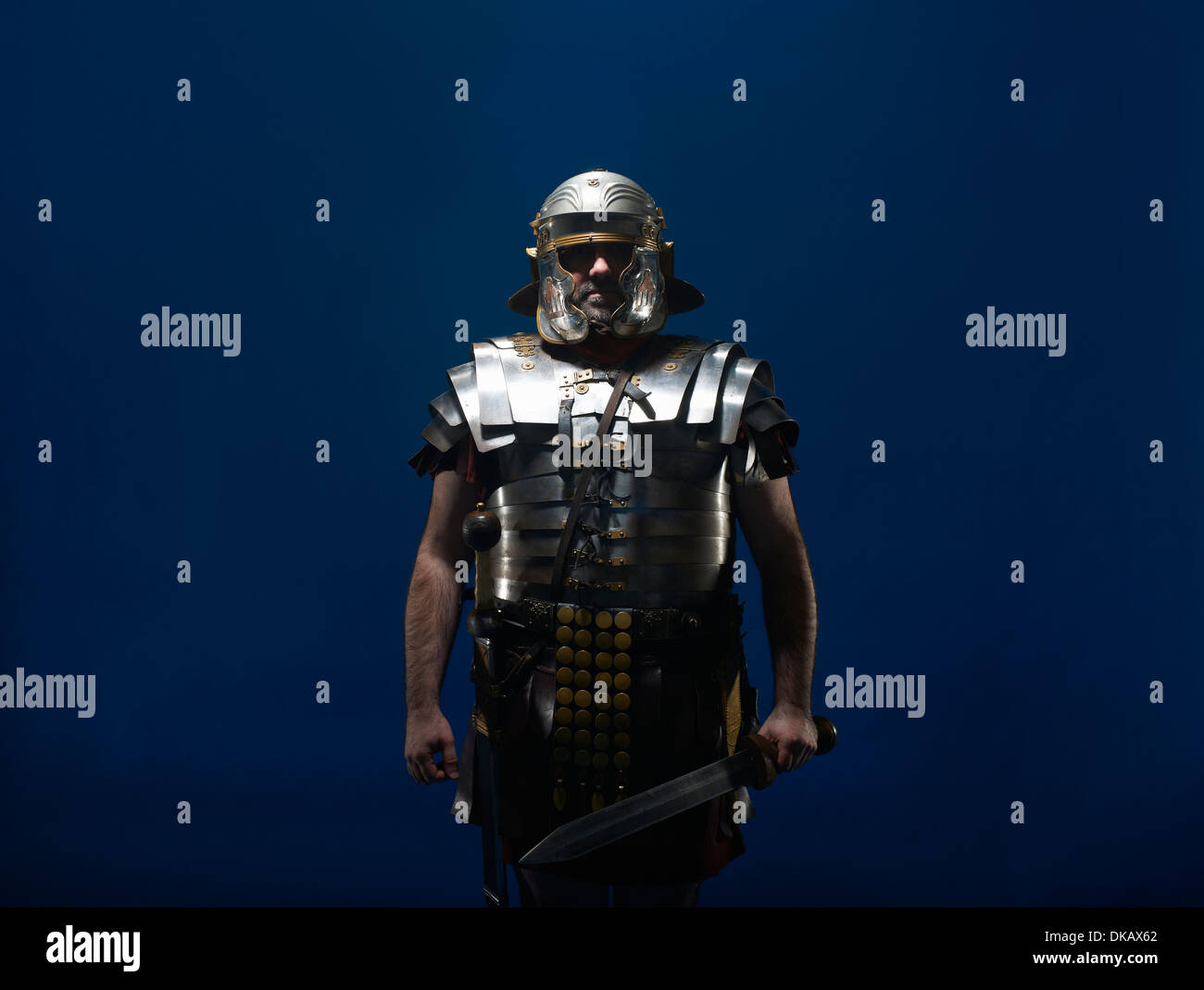 Soldier holding sword hi-res stock photography and images - Alamy