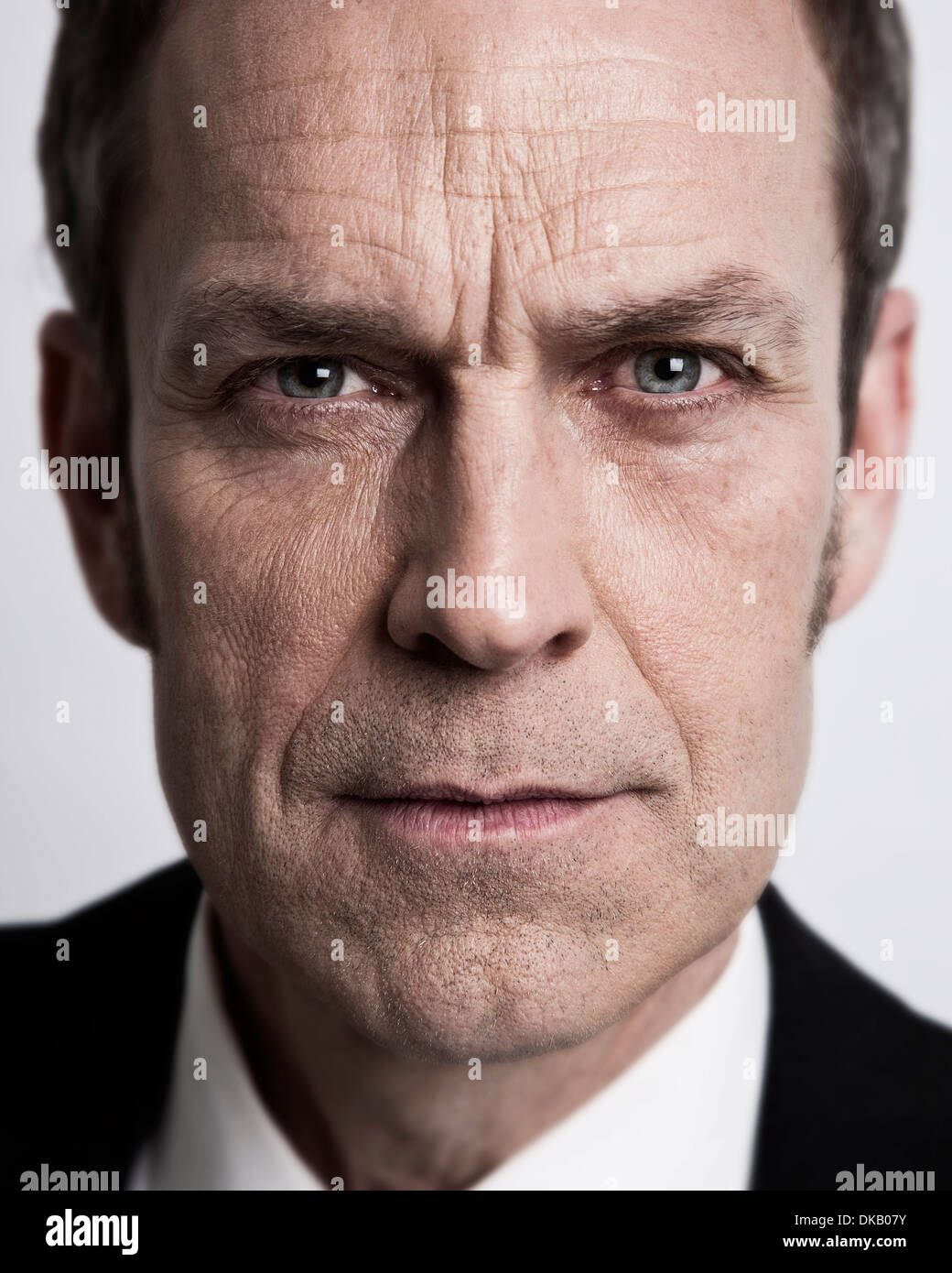 Close up of businessman's face Stock Photo - Alamy