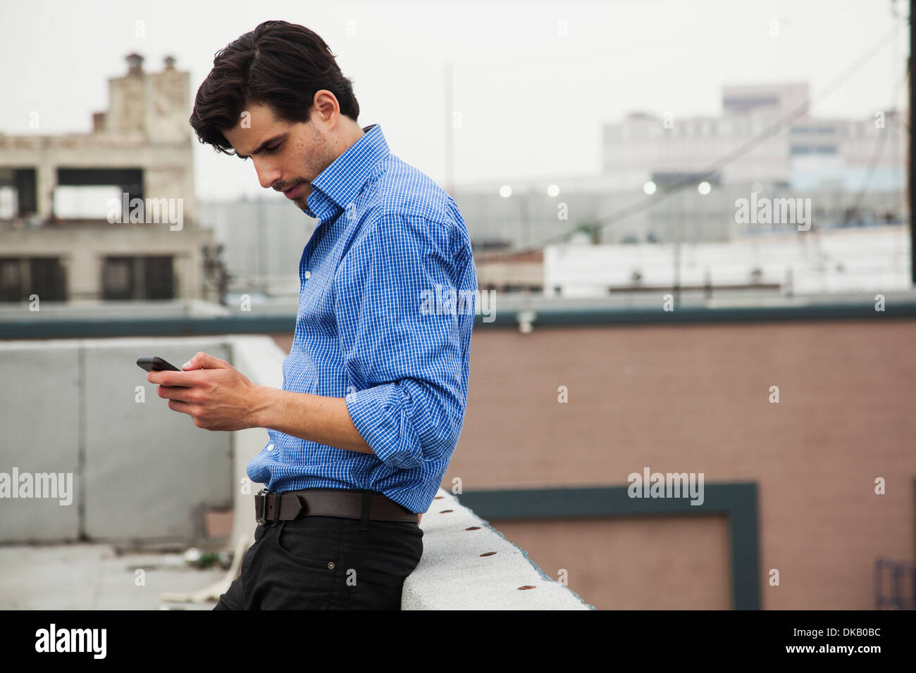 Rooftop man hi-res stock photography and images - Alamy
