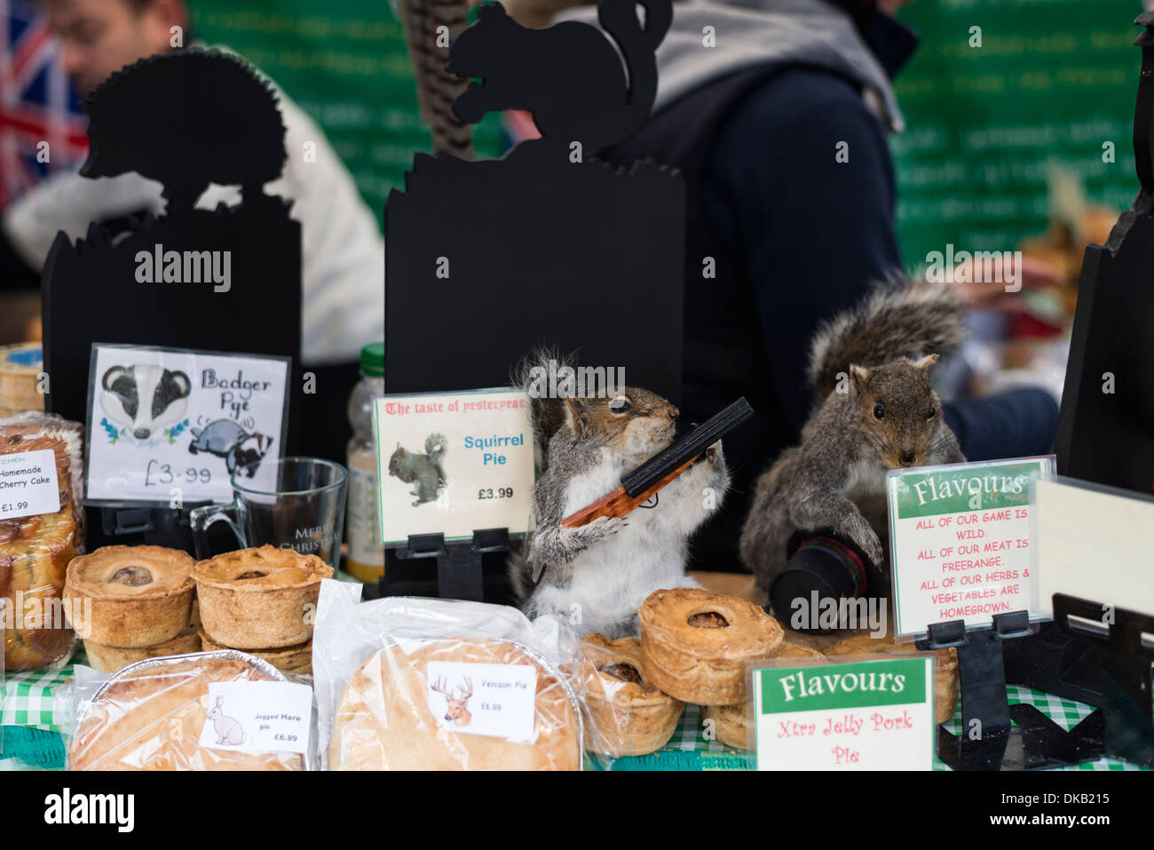 Medieval food products for sale on market stall including hedgehog pie ...