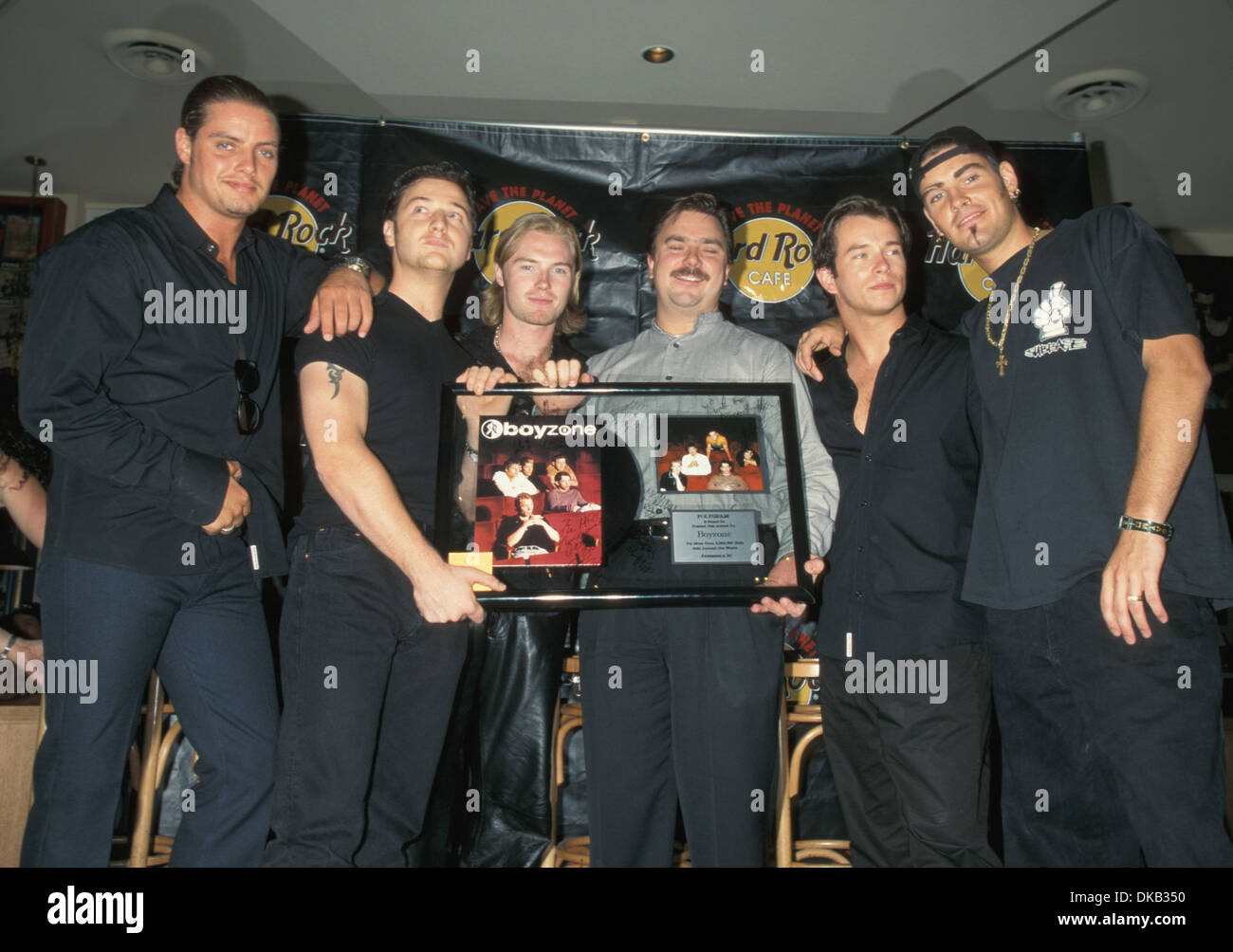 BOYZONE UK pop group in 1997 with plaque for 2 million sales. Photo ...