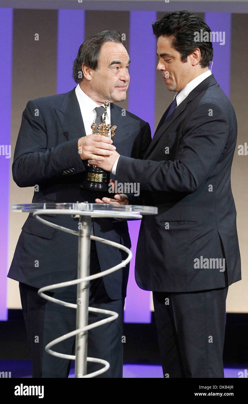 Oliver Stone and Benicio del Toro John Travolta and Oliver Stone are ...