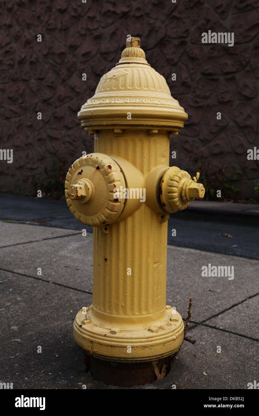 yellow fire hydrant Stock Photo - Alamy