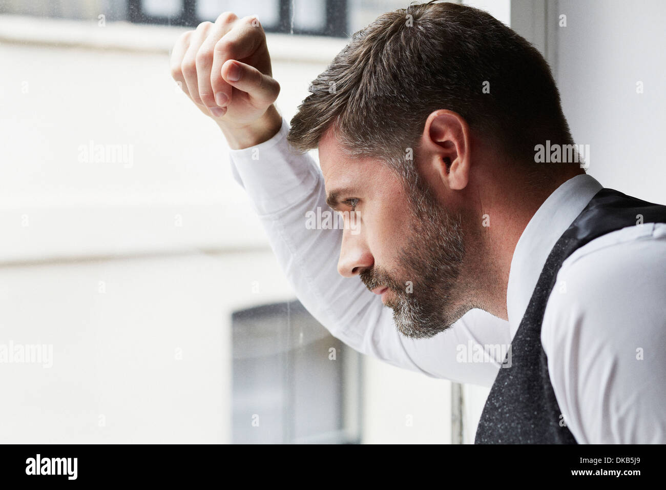Leaning out of window above hi-res stock photography and images - Alamy