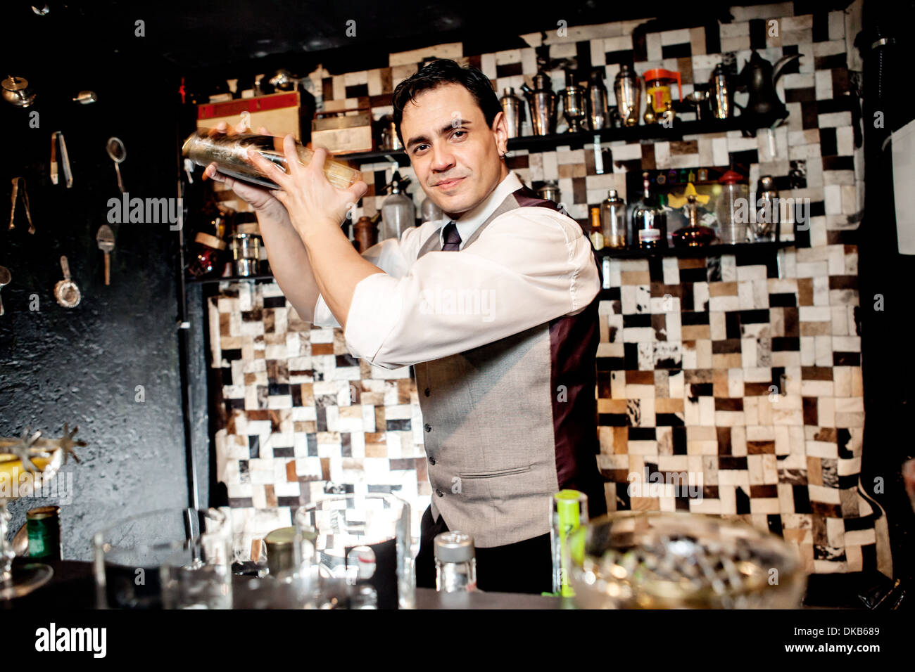 Barman mixing cocktail Stock Photo - Alamy