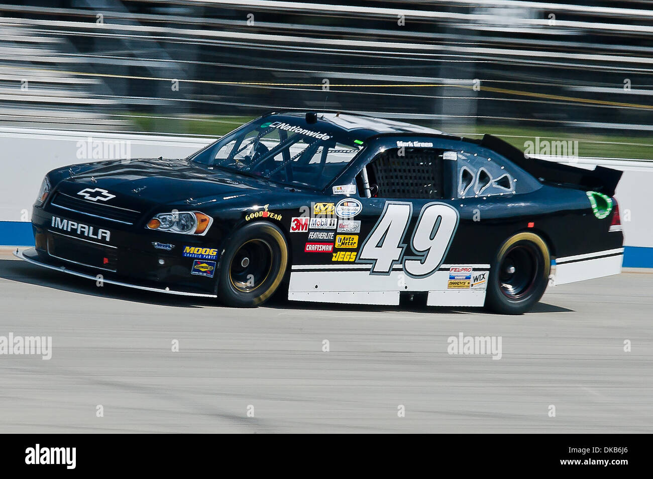 Sept. 30, 2011 - Dover, Delaware, U.S. - MARK GREEN #49 rounds turn two ...