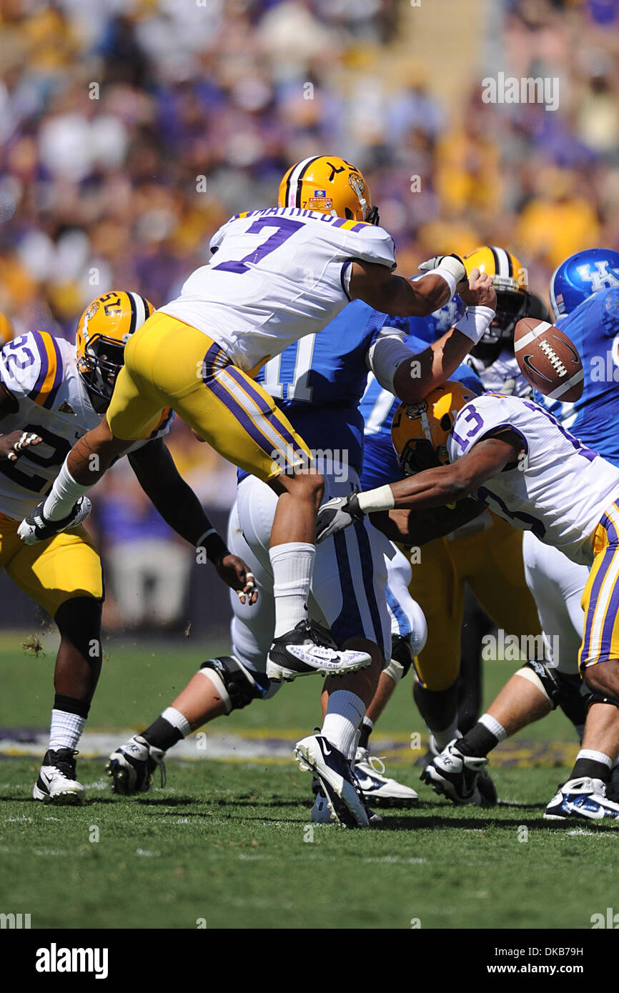 LSU Tigers cornerback Tyrann Mathieu (7) causes a fumble in the Div. 1 ...