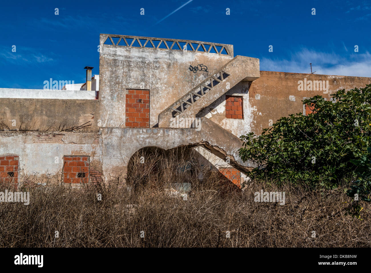 Bricked up building in a state of disrepair and abandoned Stock Photo ...