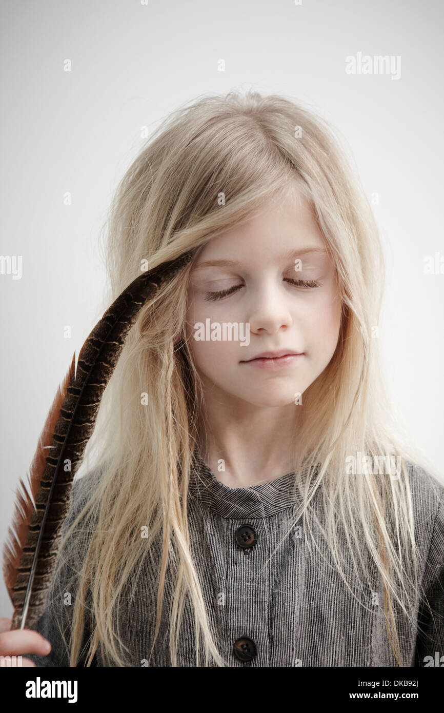 Girl With Feather In Hair