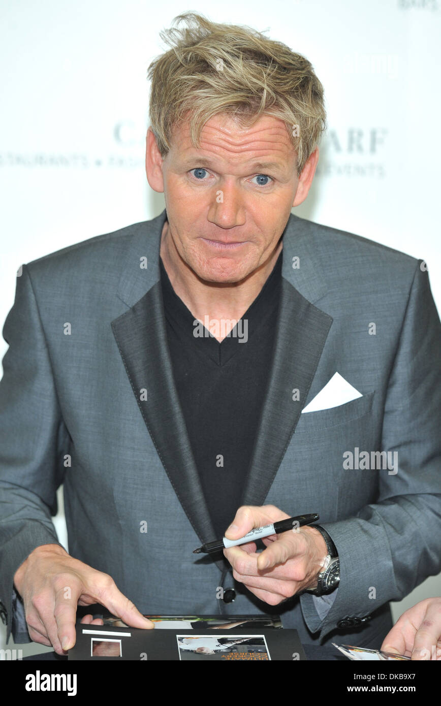 Gordon Ramsay signs his book 'Gordon Ramsay's Ultimate Cookery Course ...