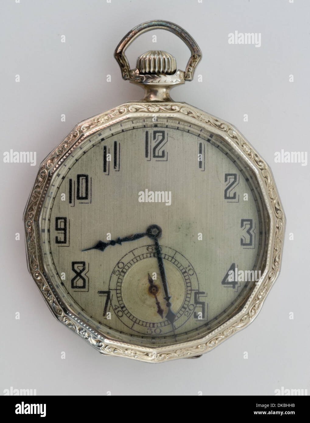 A men's silver antique pocket watch set on a white background Stock ... A men's silver antique pocket watch set on a white background Stock ...