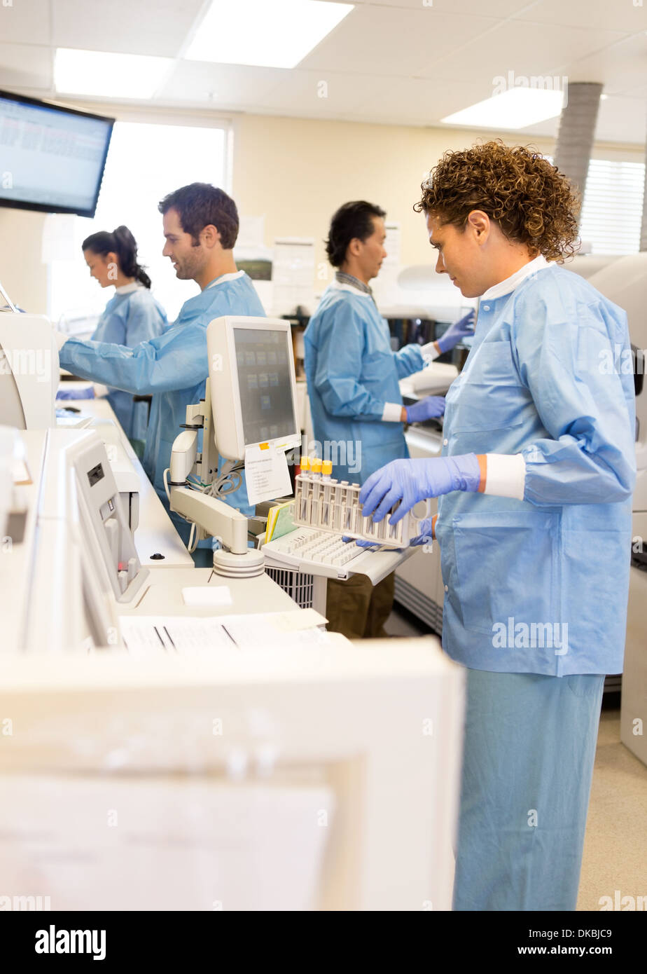 Scientists Working In Laboratory Stock Photo - Alamy