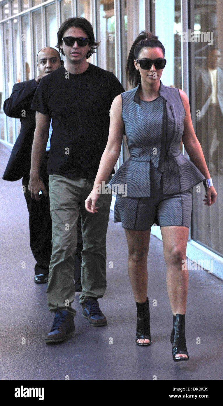 Kim Kardashian shopping in Miami Beach with best friend Jonathan Cheban ...