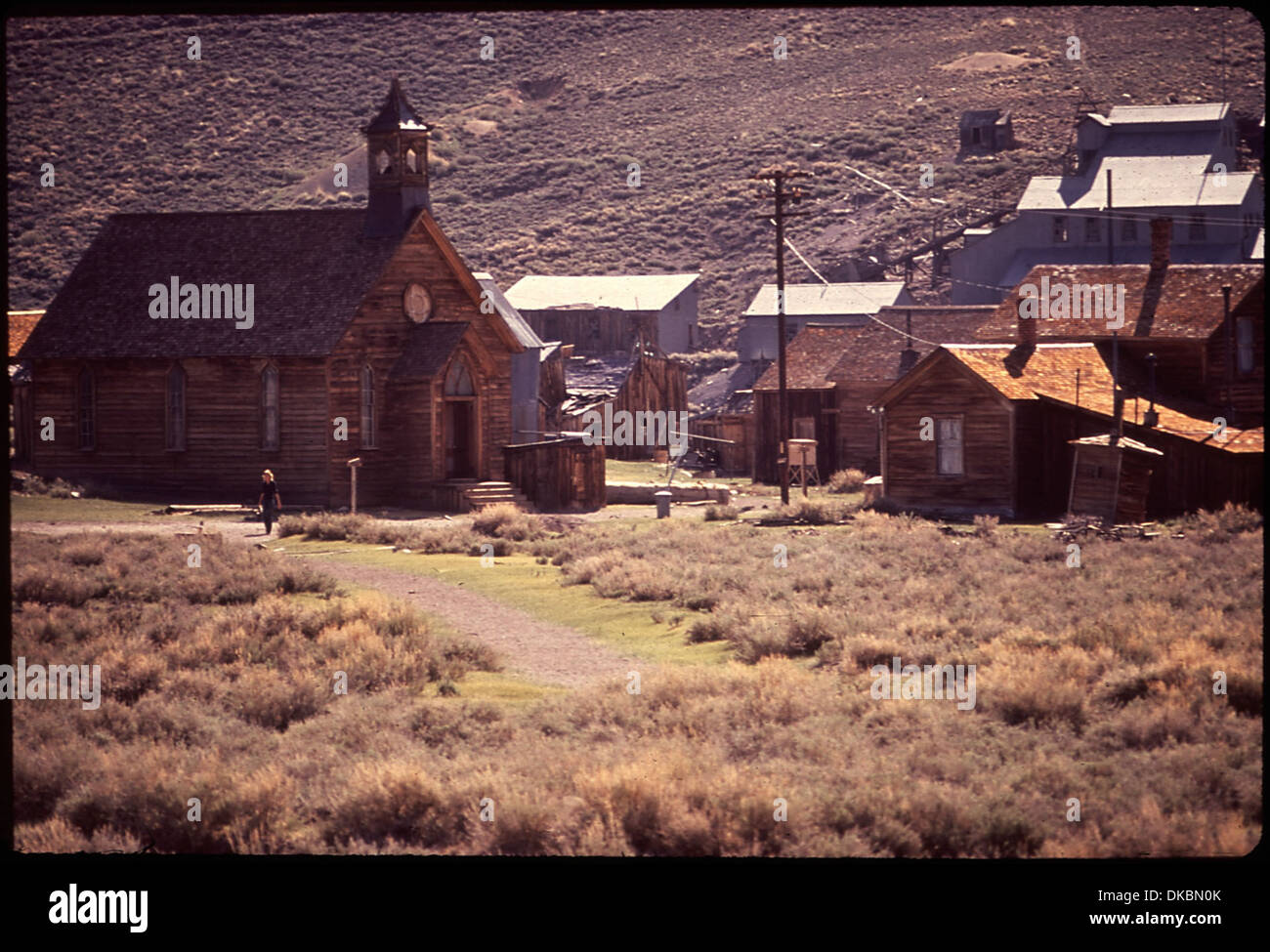 This photograph captures the eerie and abandoned state of a ghost town ...